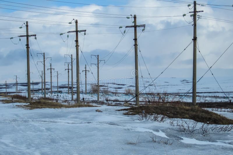 Electric Posts in Snowy Landscape Stock Image - Image of electricity ...