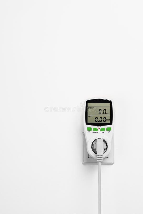 Electric Power Consumption Meter on White Wall. Stock Photo - Image of ...