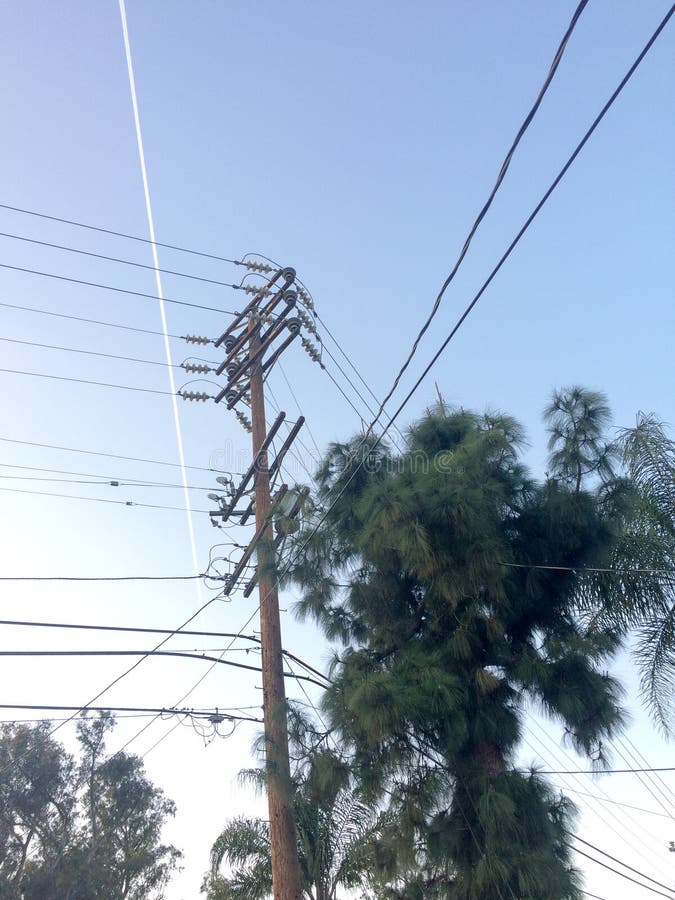Electric power lines stock image. Image of architecture - 180924997
