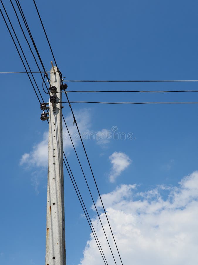 Electric Power Lines Soaring into Blue Sky Stock Photo - Image of ...