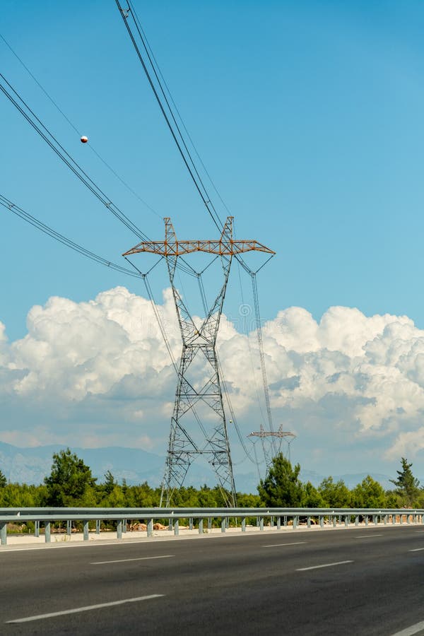 Electric Power Poles High Voltage Electrical Power Poles Along a ...