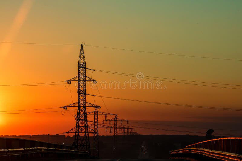 Electric Power Pylon, Electric Tower at Sunset Stock Photo - Image of ...