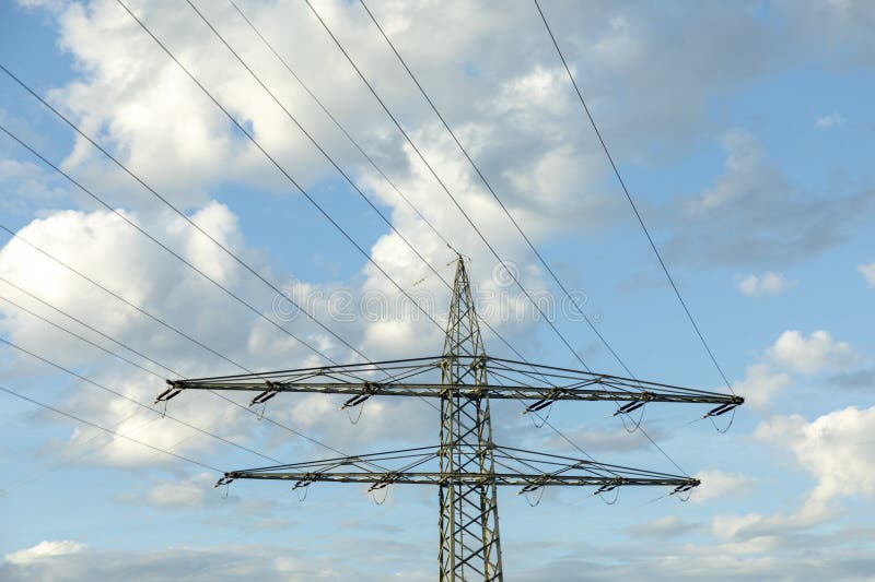 Electric Pylon at Corn Field with Cloudy Sky in Scenic Afternoon Light ...