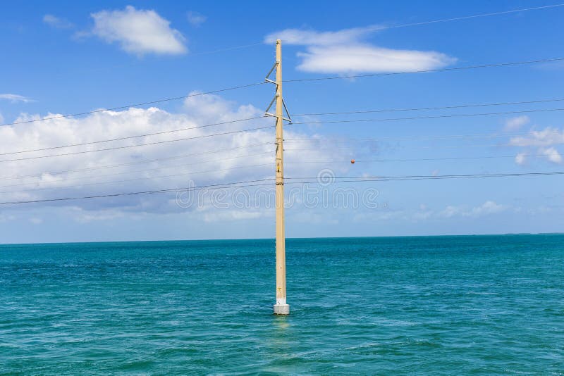 Electric Pylon in the Ocean Stock Photo - Image of blue, pylon: 60518290