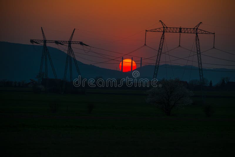 Solar Disk at the Sunset in Electric Pylon Stock Photo - Image of ...