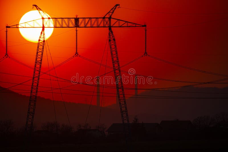 Solar Disk at the Sunset in Electric Pylon Stock Photo - Image of pylon ...