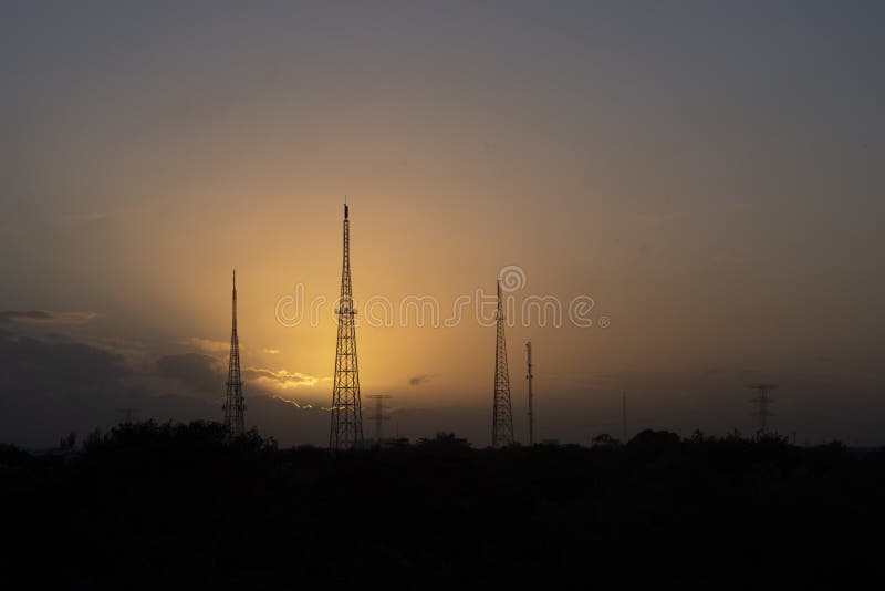 Electric Pylons Amidst the Sunset Stock Image - Image of warmth, cool ...