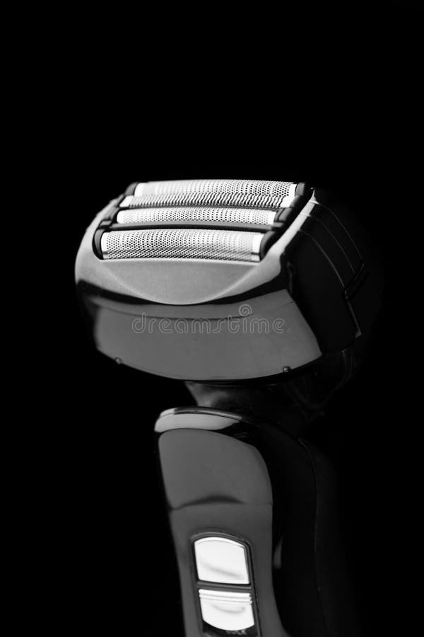 Electric razor on black stock image. Image of vertical - 29766787