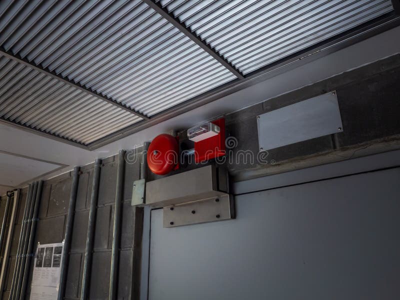 Electric Red Fire Ring Bell Alarm on the Wall Stock Image - Image of ...