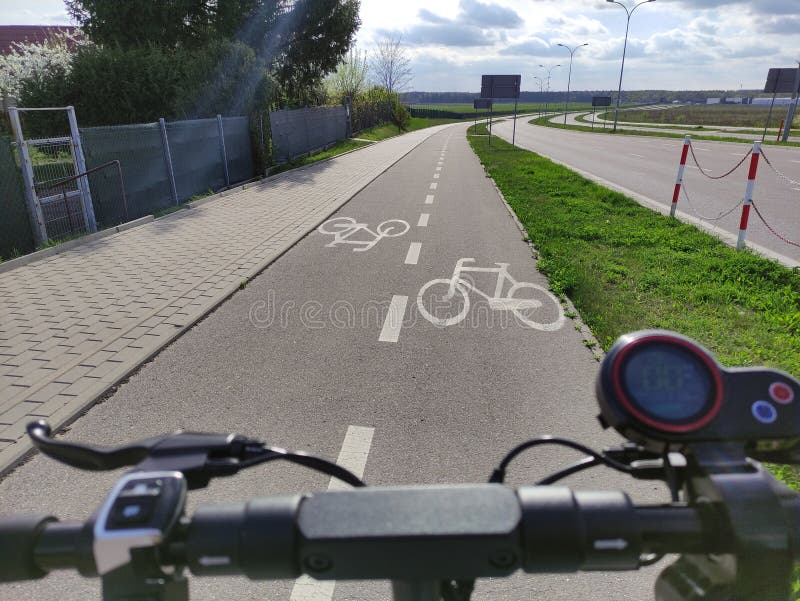 Electric Scooter on the Bike Path. First-person View Stock Image ...