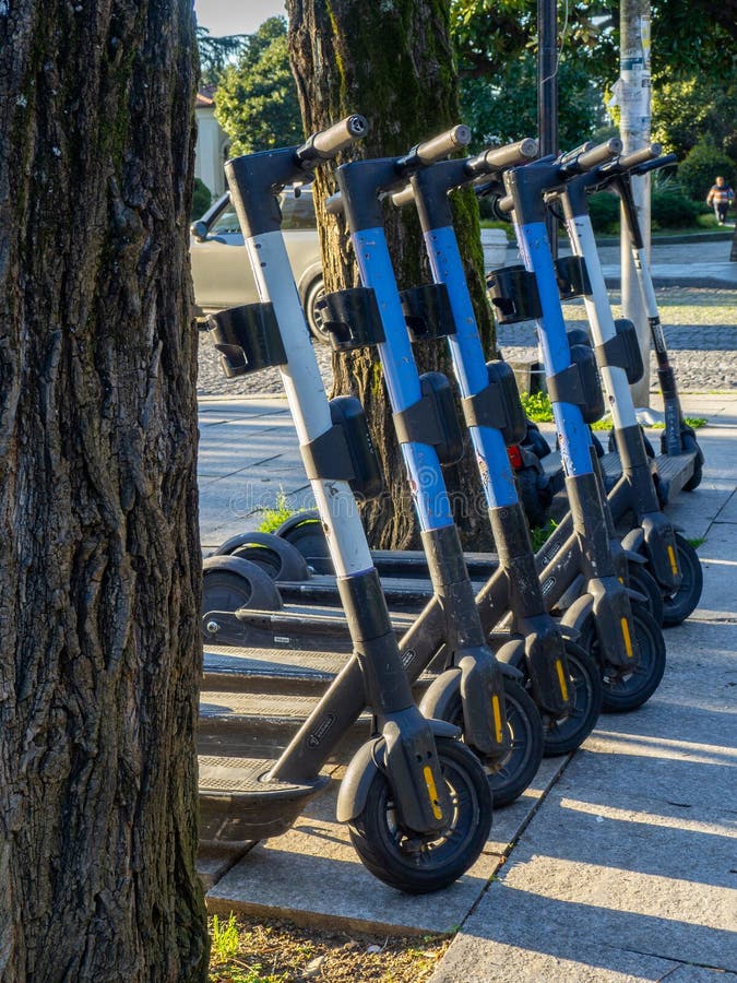 Electric Scooters in the Parking Lot. a Row of Scooters Stock Photo ...