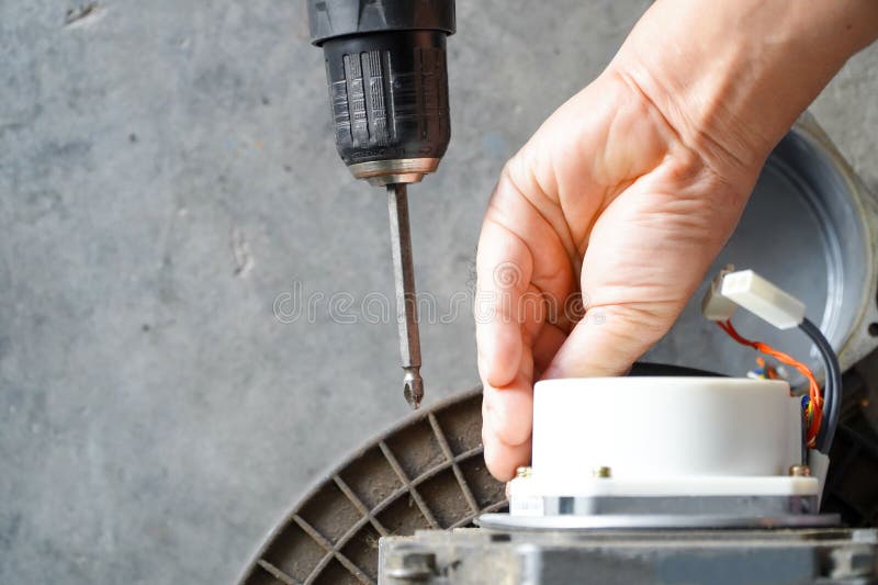Electric Servo Motor,Repairman Using Cordless Screwdriver Removing ...