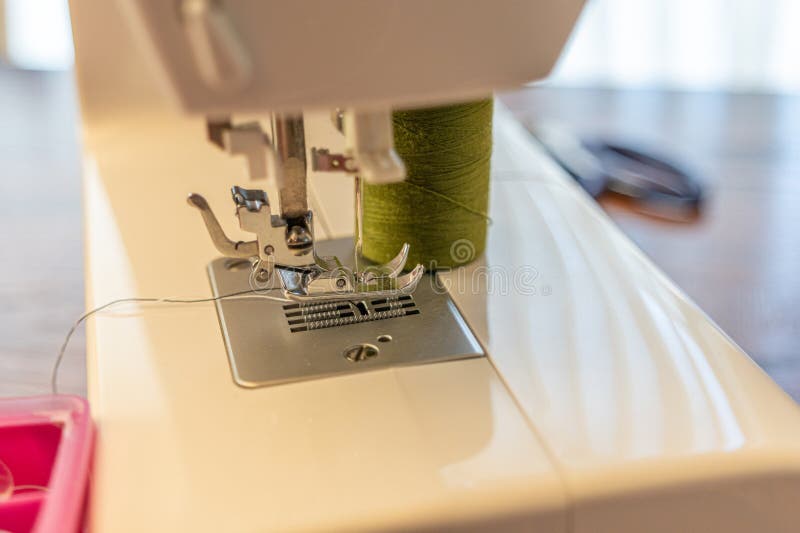 Electric Sewing Machine Needle with Spools of Thread Stock Photo ...