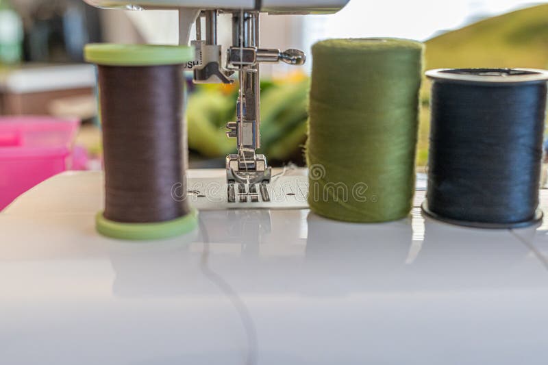 Electric Sewing Machine Needle with Spools of Thread Stock Photo ...