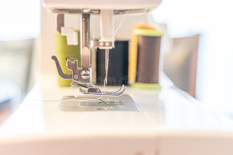 Electric Sewing Machine Needle with Spools of Thread Stock Image ...