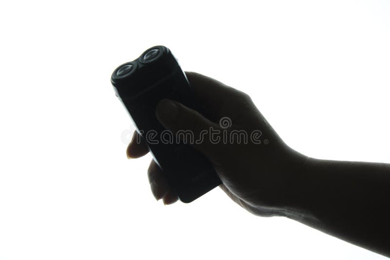 Electric shaver in hand stock image. Image of holding - 45988839