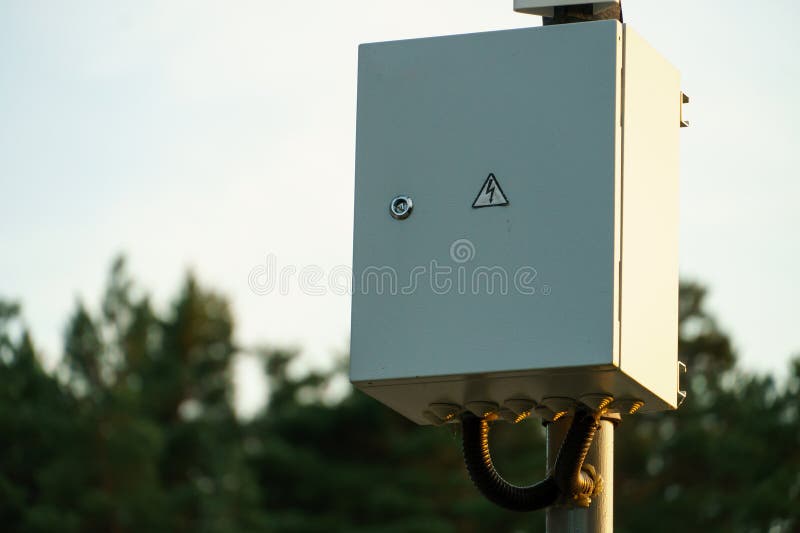 An Electric Shield on a Pole on the Street. High Voltage Stock Photo ...