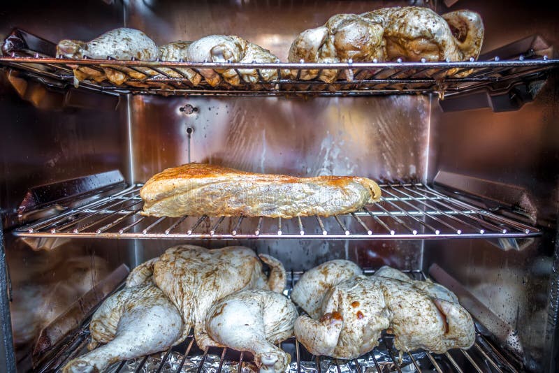 Electric Smoker Loaded with Variety of Meat Stock Image - Image of ...