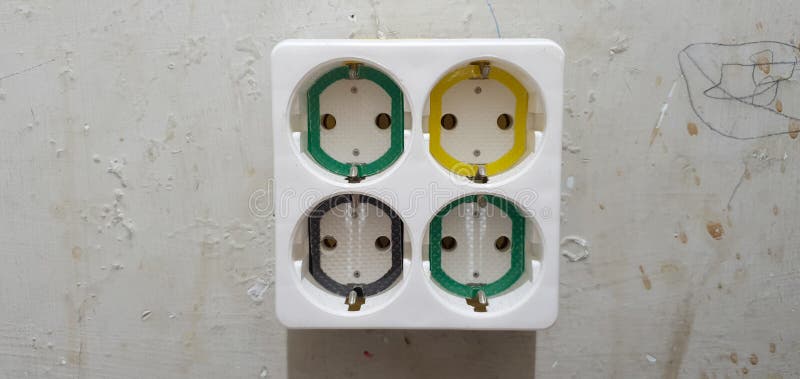 An Electric Socket that Contains 4 Holes Stock Image - Image of ...