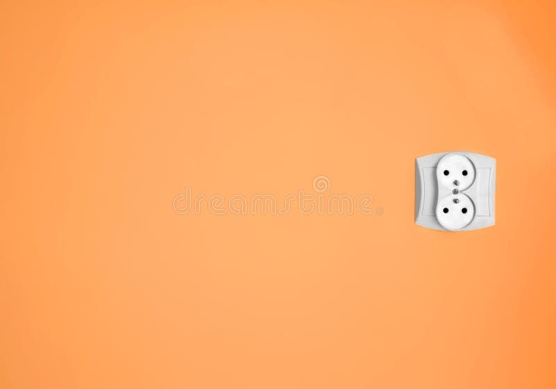 Electric Socket on Orange Wall Stock Photo - Image of orange, power ...