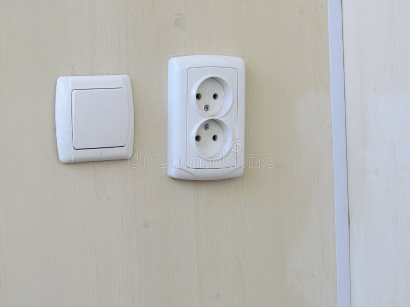 Electric Socket and a Switch Fixed on the Wall Stock Image - Image of ...