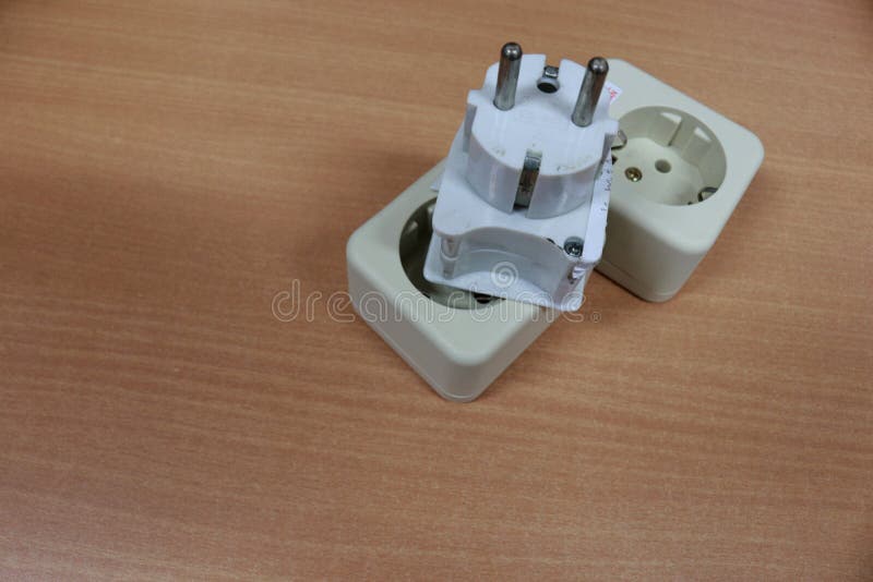 An Electric Socket on the Table Stock Image - Image of white, connector ...