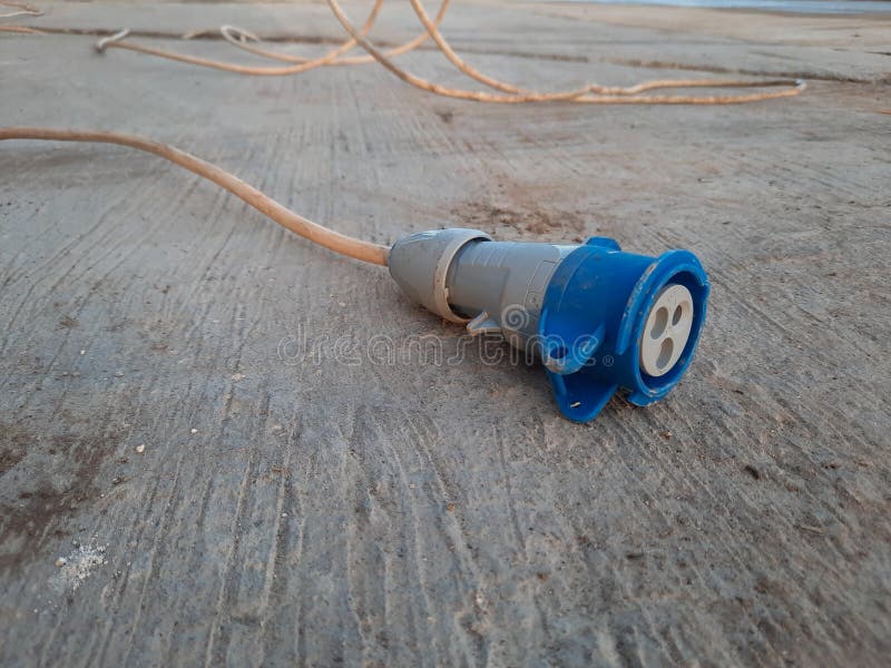 Electric Socket with a Three-pin Model and Not in Use and Placed on a ...