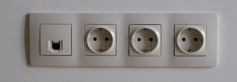 Electric Socket on White Wall Closeup. Sockets with Antenna Cable and ...