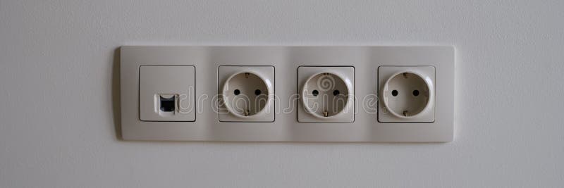 Electric Socket on White Wall Closeup. Sockets with Antenna Cable and ...