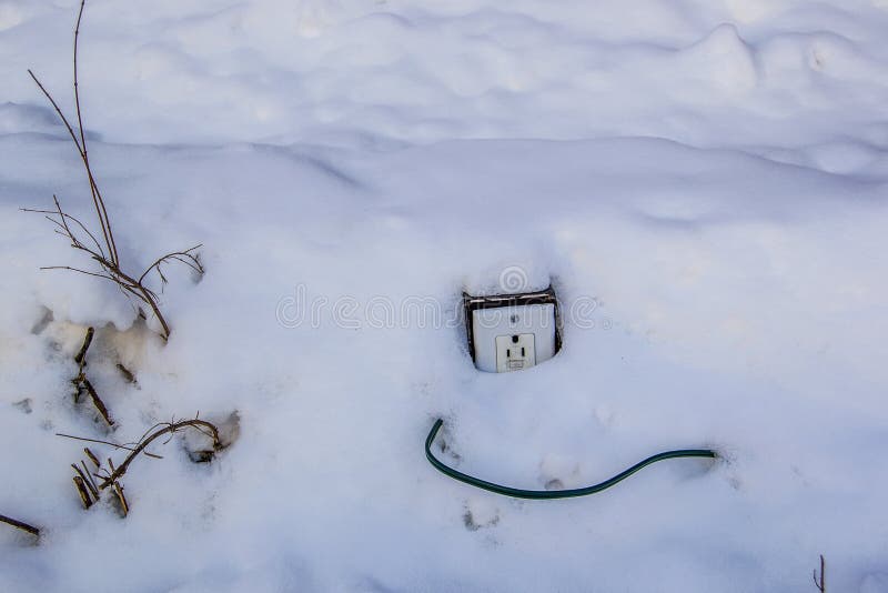 Electric Socket in Snow stock image. Image of frozen - 109872119