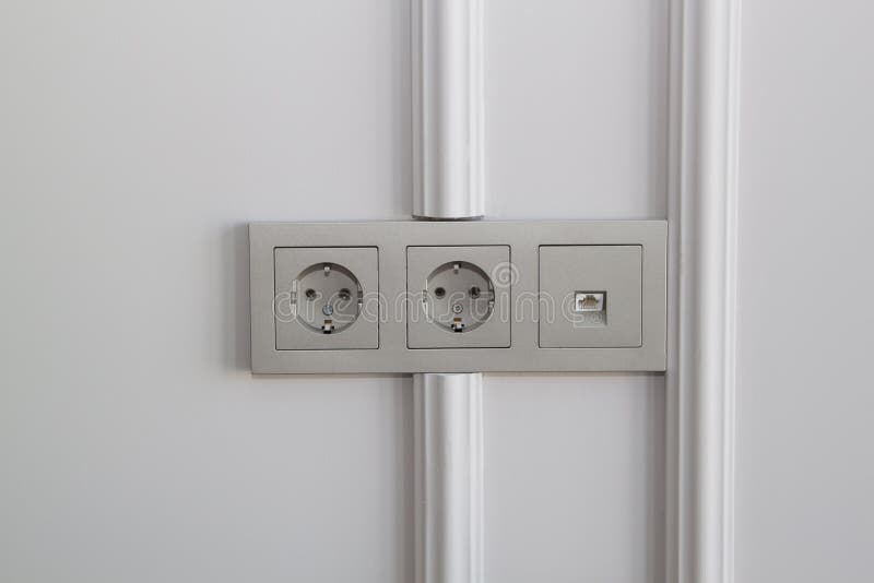Electric Sockets and Internet Socket in Champagne Color on the Wall ...