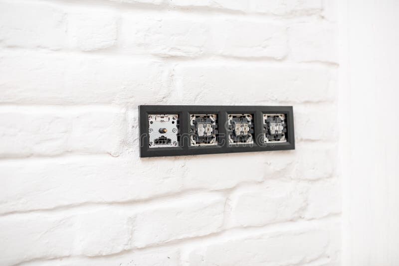 Electric Sockets on the Wall Stock Photo - Image of switch, electrical ...