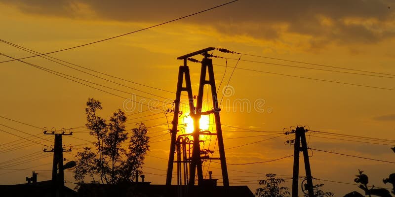 Electric Sunset, Power Lines Silhouetted Against Vivid Sky Stock Photo ...