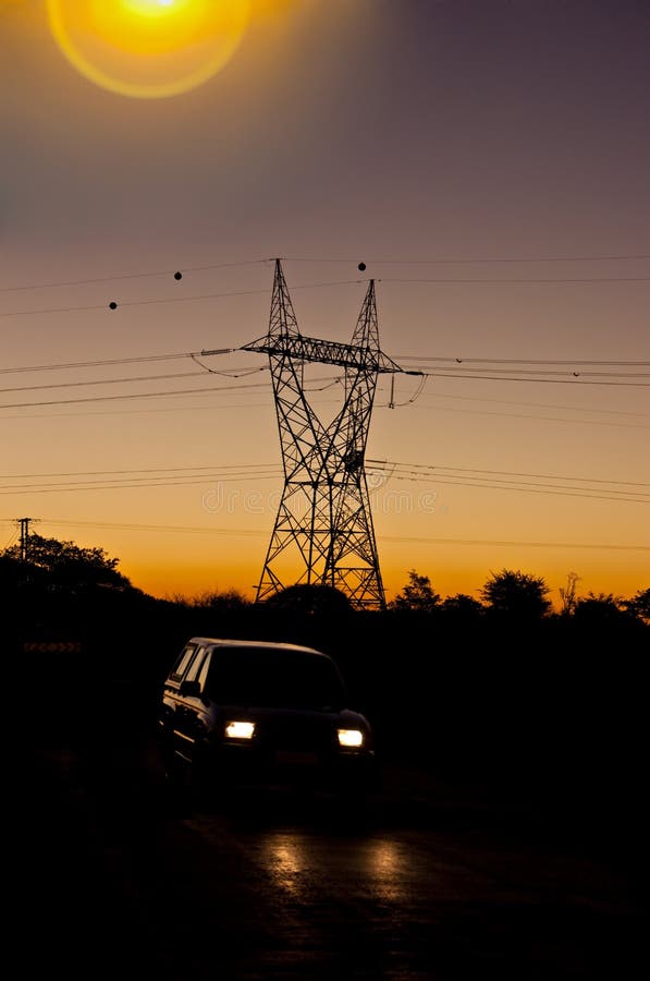 Electric Sunset Silhouettes Stock Image - Image of vehicle, electrical ...