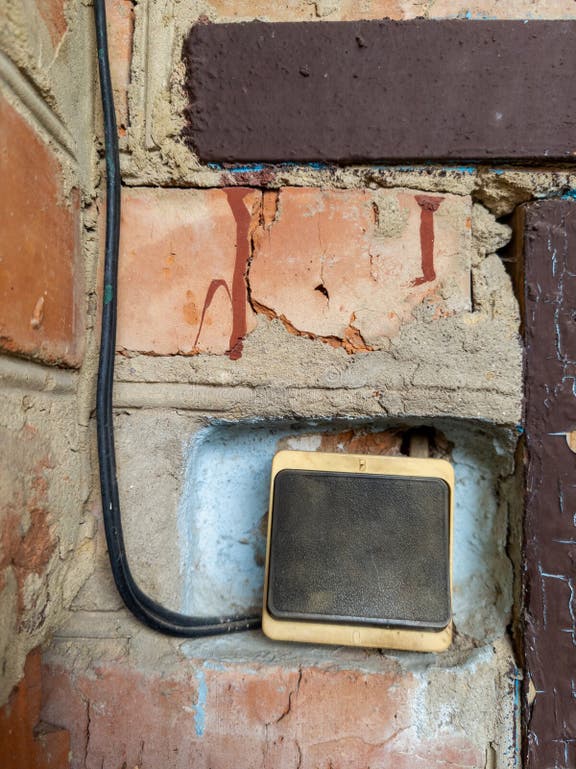 Electric Switch with a Wire on a Brick Wall Stock Image - Image of worn ...