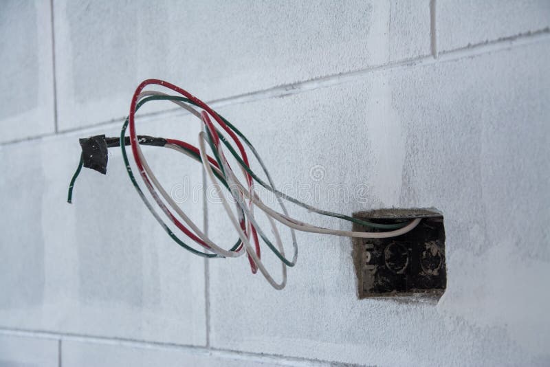 Electric System on Wall in Construction Site ,outlet with Iron Pipes ...