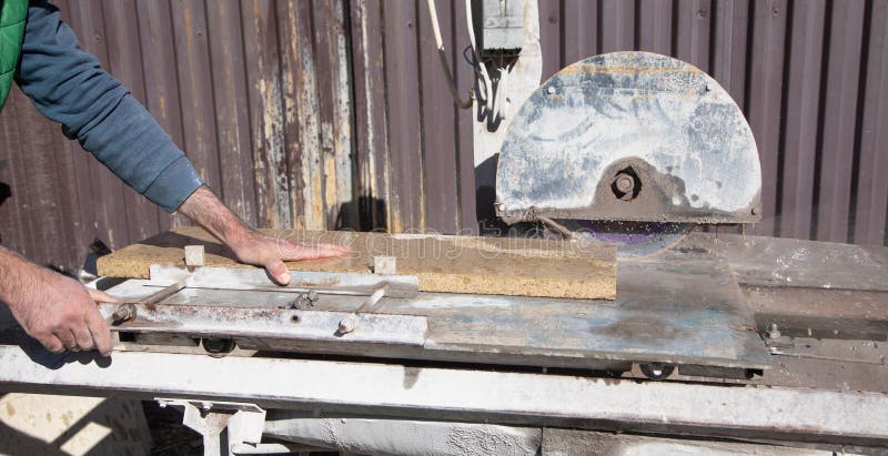 Electric Tile Cutter. Tiler Cutting Tile on Wet Saw Machine Stock Image ...