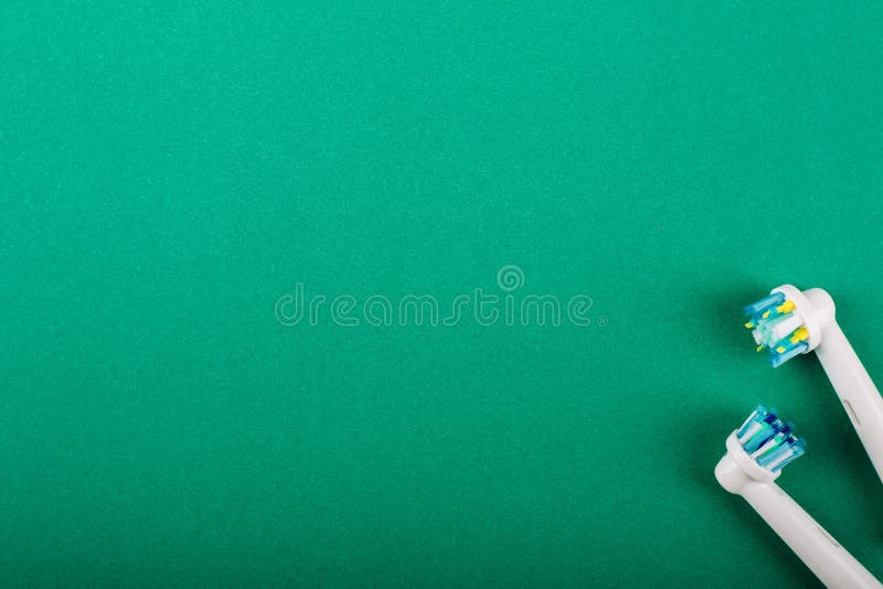 Electric Toothbrush on a Green Background. Stock Image - Image of ...