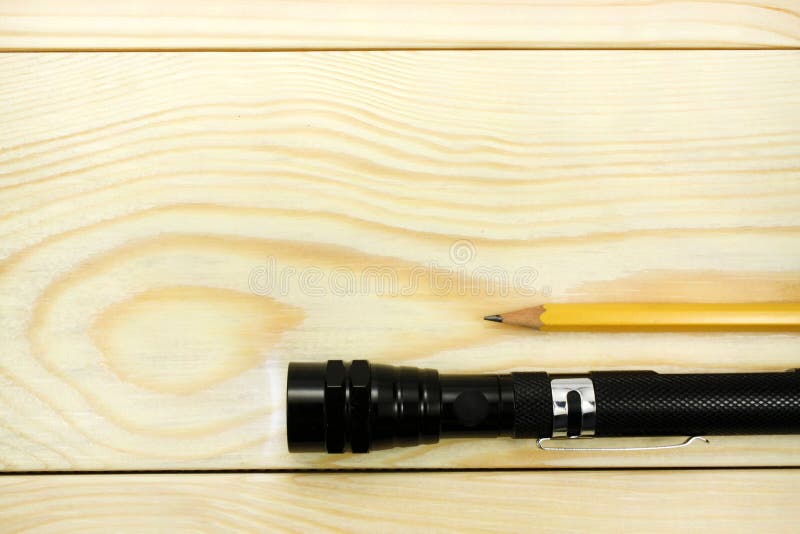 Electric Torch on a Wooden Table Stock Image - Image of closeup, power ...