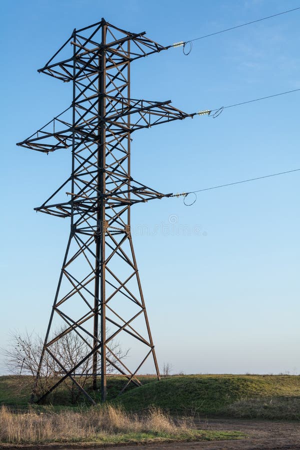 Electric Tower in the Field Stock Photo - Image of insulators ...