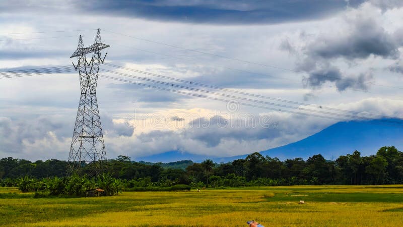 Electric Tower with Mountain Background with Very Dramatic Clouds and ...