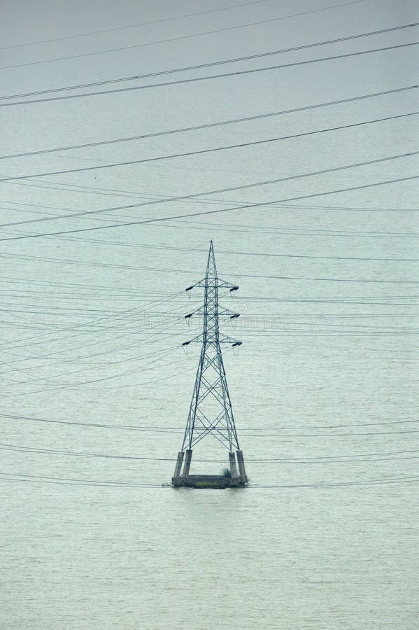Electric Tower Passing through the Reservoir Area Stock Photo - Image ...