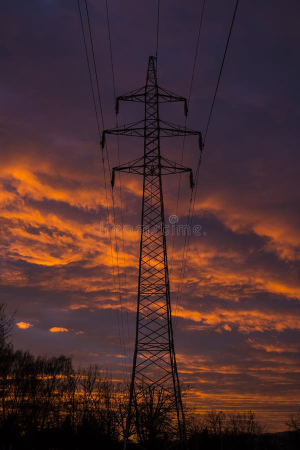 Electric tower at sunset stock photo. Image of structure - 175376916