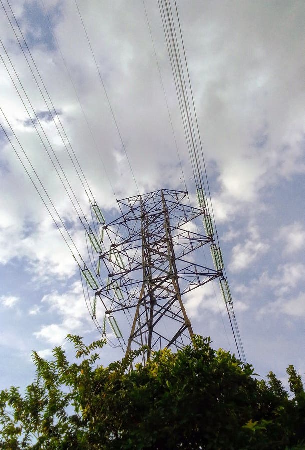 Electric Tower on Tree with Cloud Sky Stock Photo - Image of tree ...