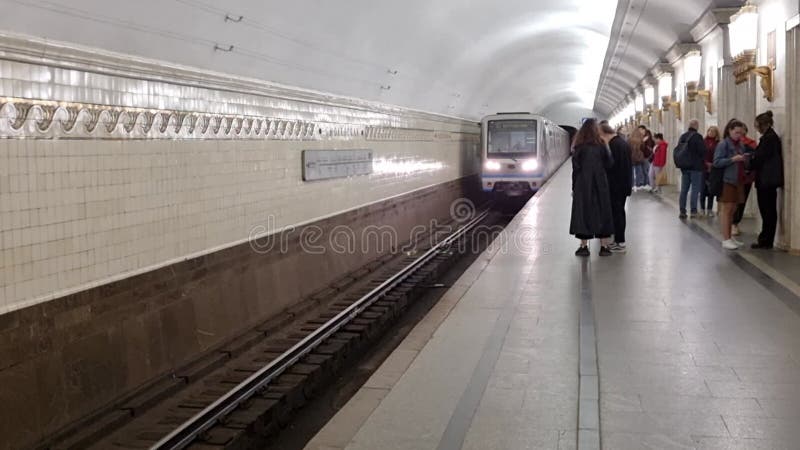 The Electric Train Arrives on the Platform of the Moscow Metro. Stock ...