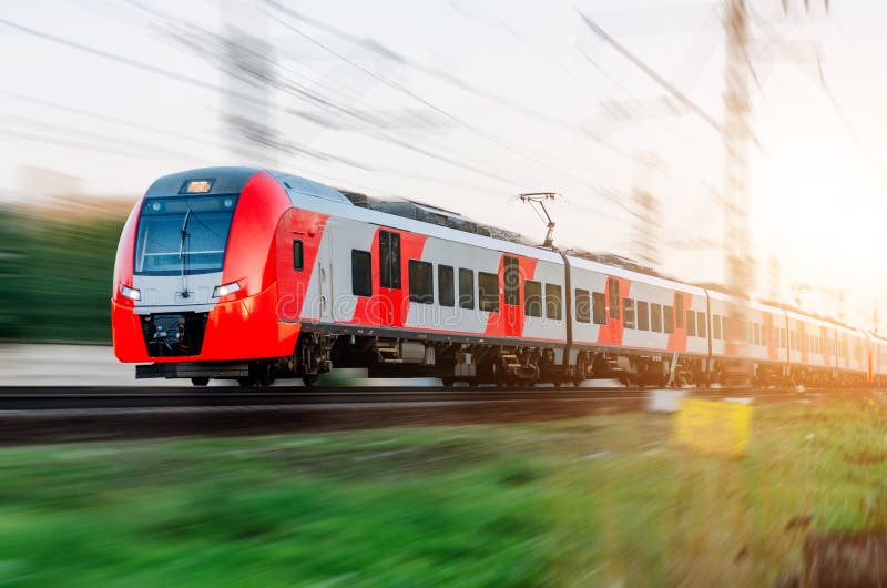 The Electric Train Drives at High Speed at the Station. Stock Image ...