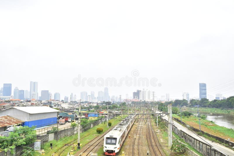 An Electric Train or KRL is Passing on the Tanah Abang Editorial Stock ... An Electric Train or KRL is Passing on the Tanah Abang Editorial Stock ...