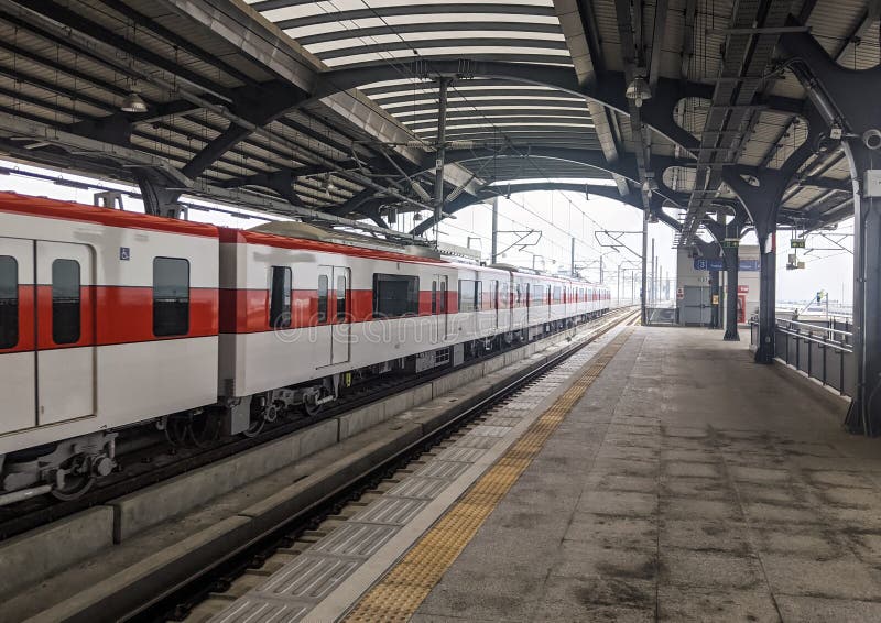 The Electric Train is Leaving from the Station To the Suburbs Area in ...