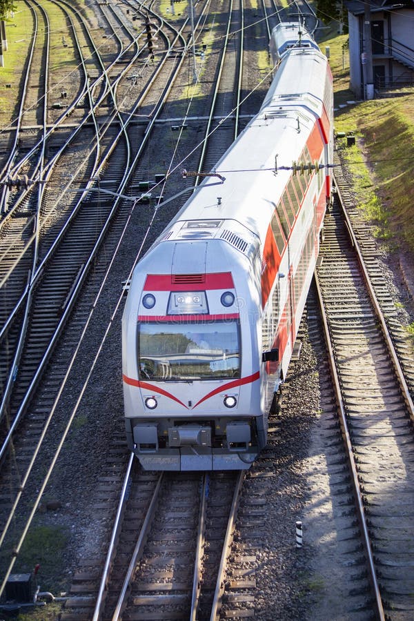 Electric Train in a Rails Background Stock Image - Image of city ...