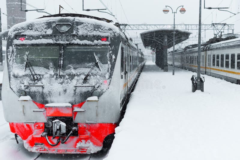 Electric Train in Snow in a Blizzard on an Empty Platform Stock Image ...
